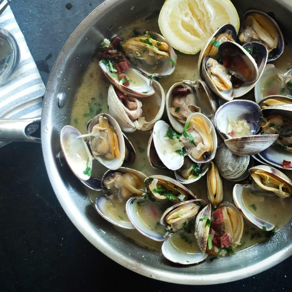 Fresh Clams with Garlic, Lemon + Vinho Verde | This Doctors Kitchen